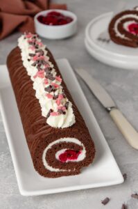 Fluffy Chocolate Cake Roll with Whipped Cream & Cherries - Alice Dias